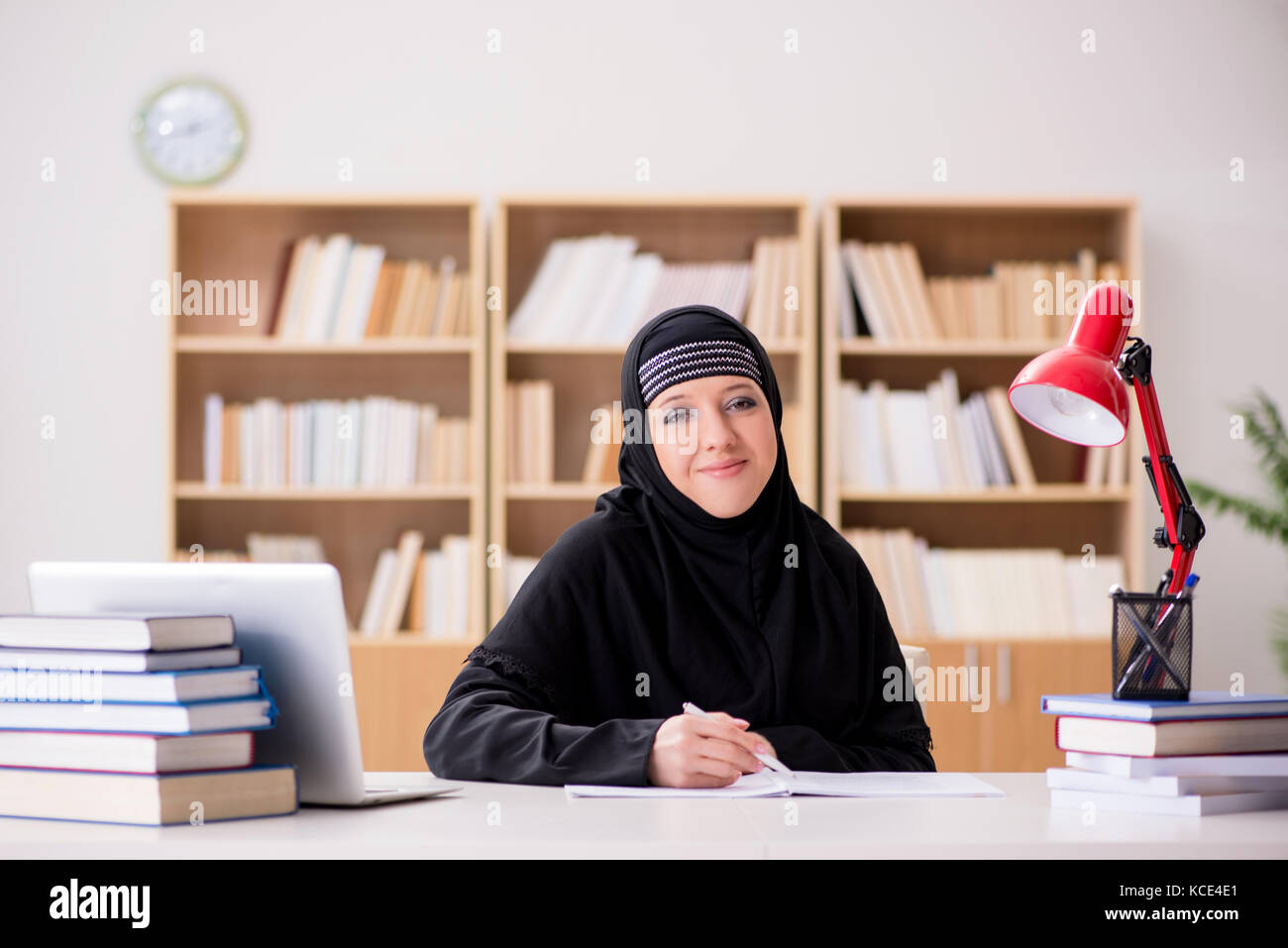 Muslim girl in hijab studying preparing for exams Stock Photo - Alamy