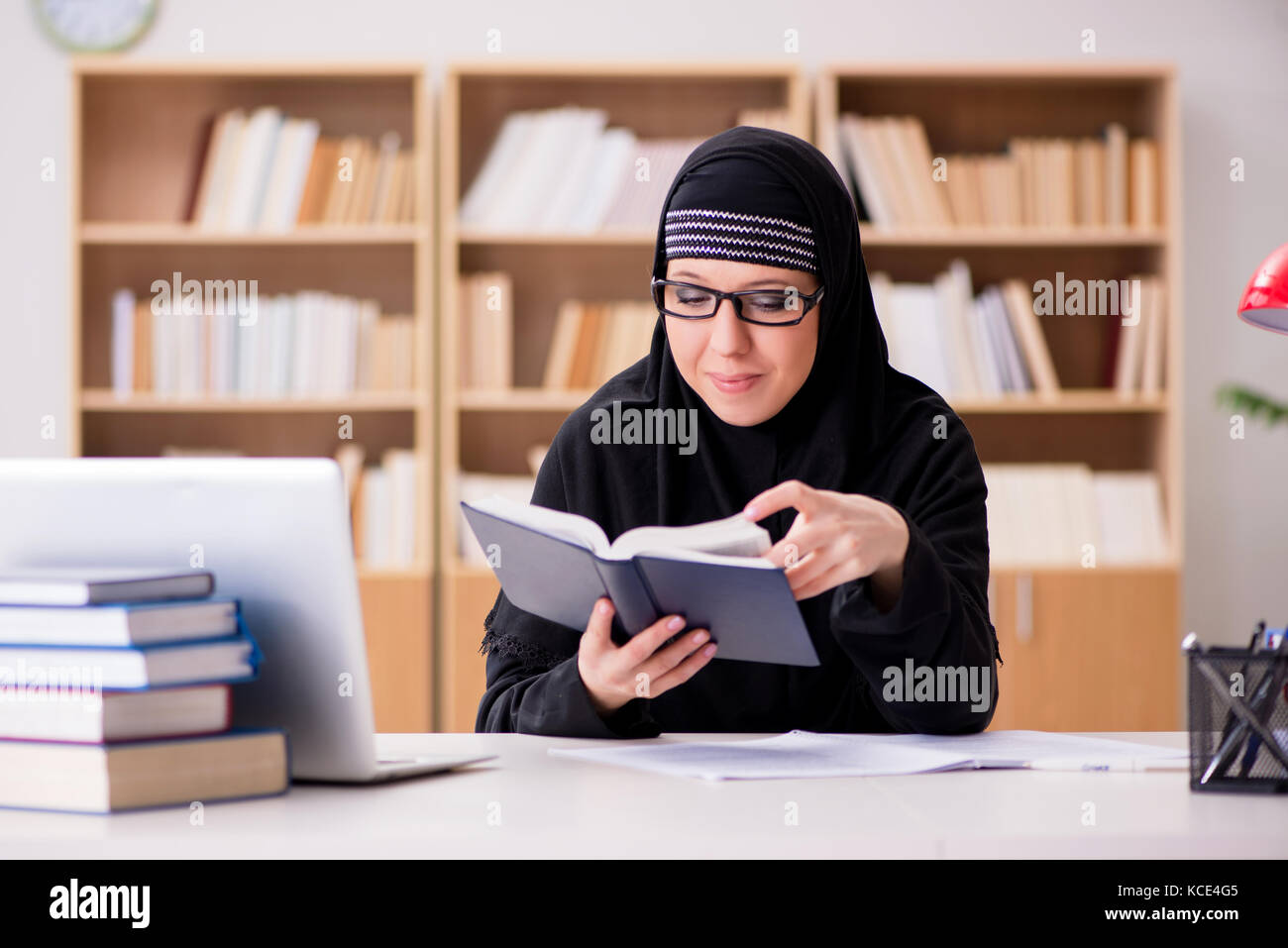 Muslim girl in hijab studying preparing for exams Stock Photo - Alamy