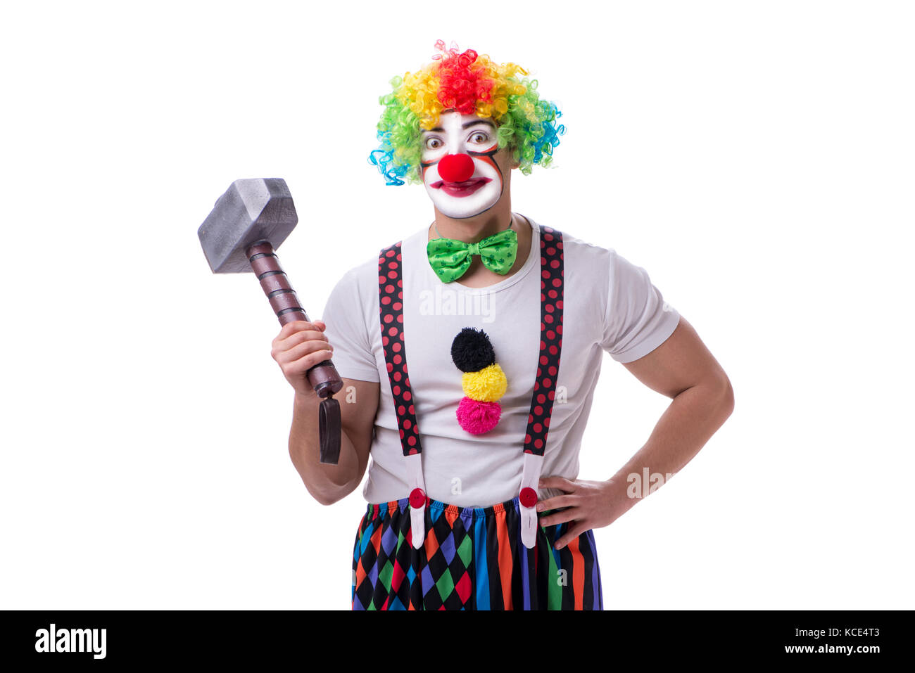 Funny clown with a hammer isolated on white background Stock Photo - Alamy