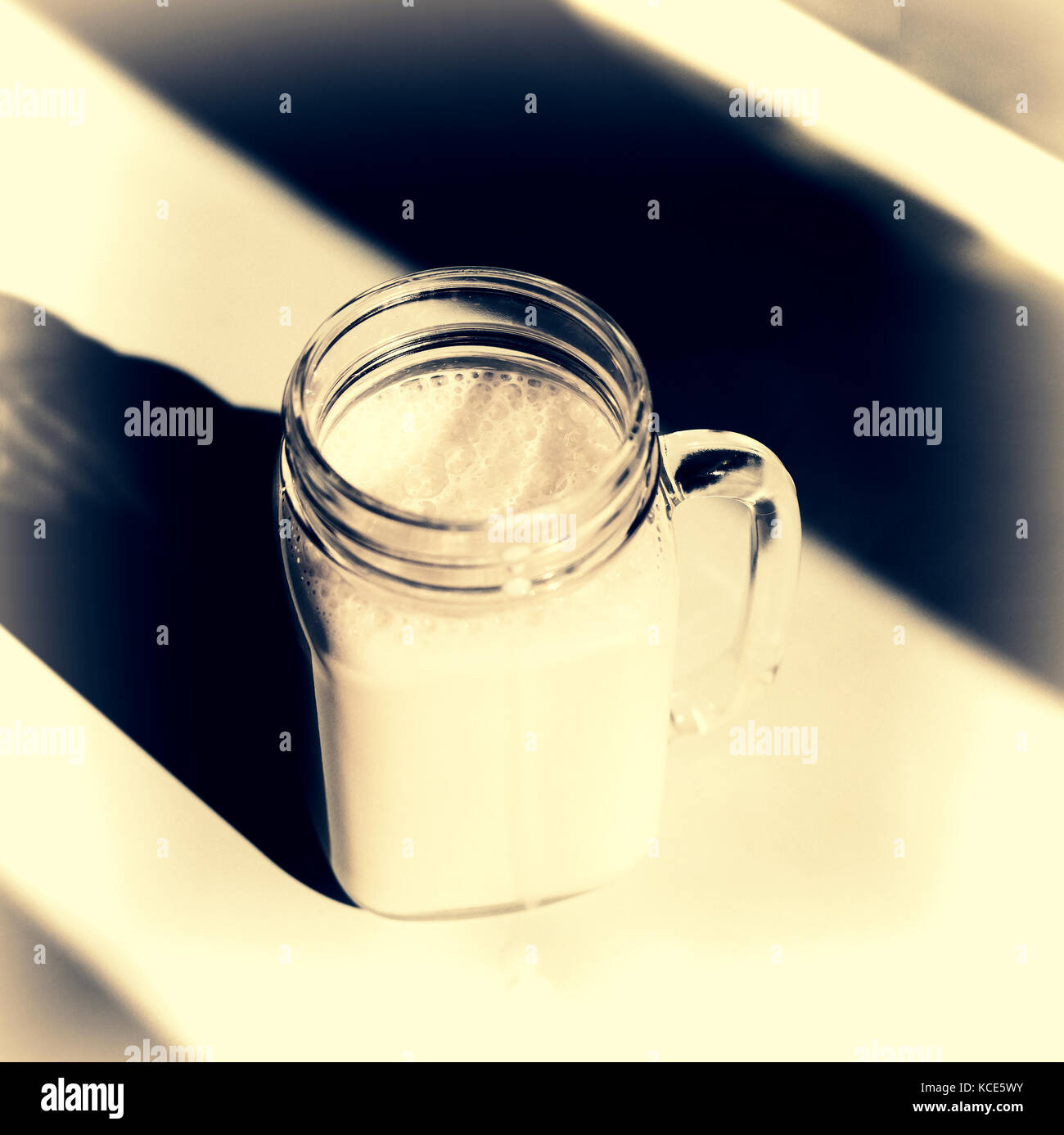Breakfast. Fresh milk in a mug or yogurt. Morning Shadows healthy Stock ...