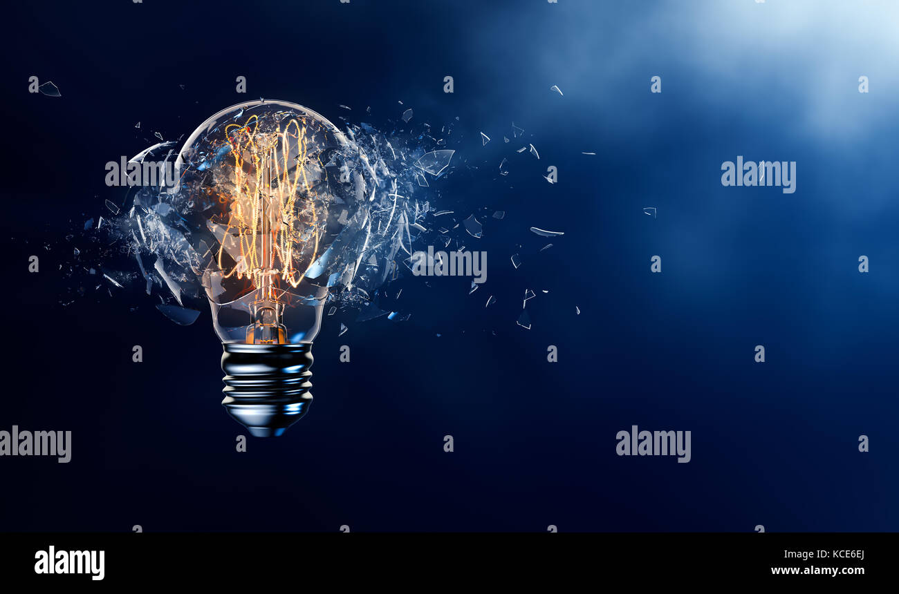 Exploding light bulb on a blue background Stock Photo - Alamy