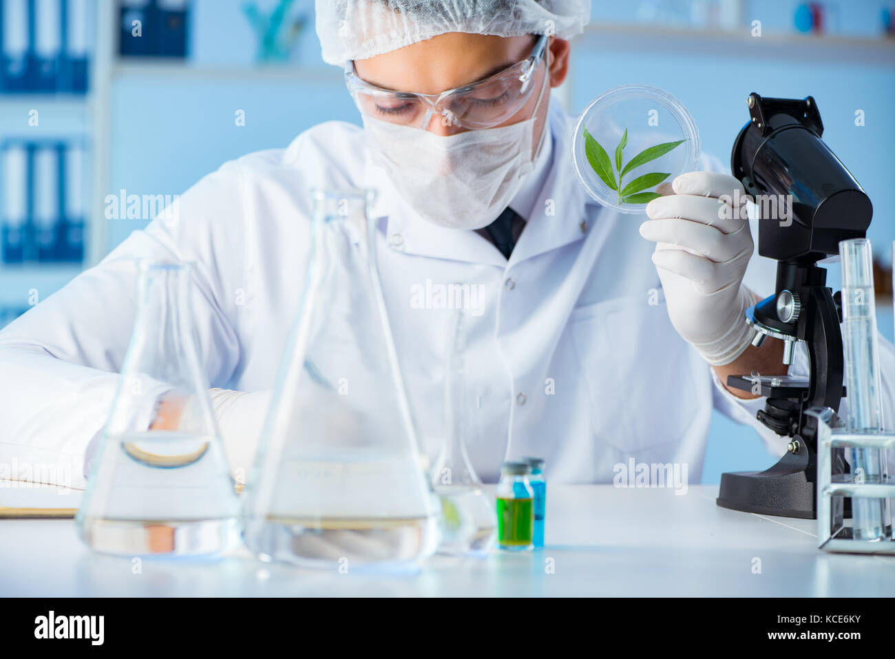 Biotechnology concept with scientist in lab Stock Photo - Alamy