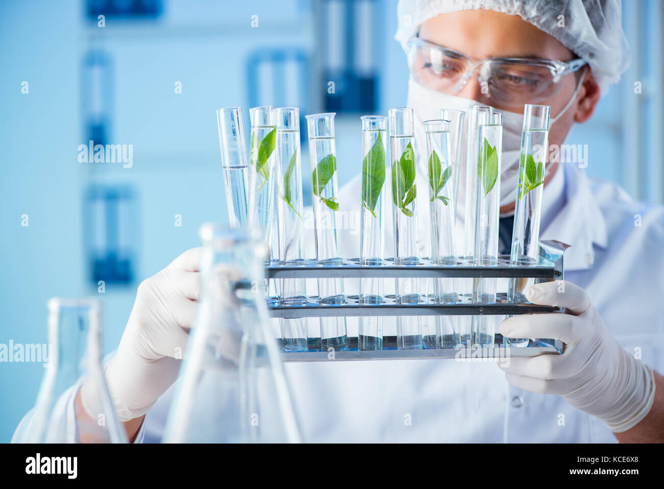 Biotechnology concept with scientist in lab Stock Photo - Alamy