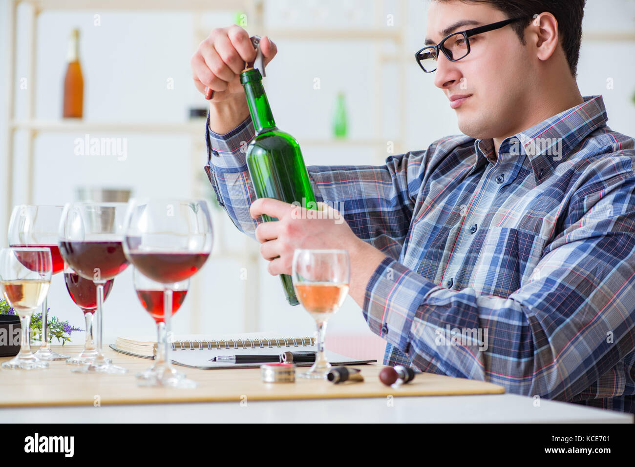 Professional sommelier tasting red wine Stock Photo - Alamy