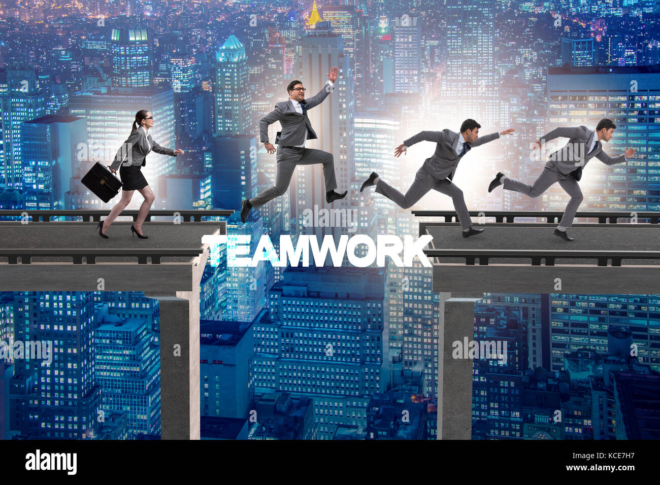 Teamwork concept with business people crossing bridge Stock Photo - Alamy
