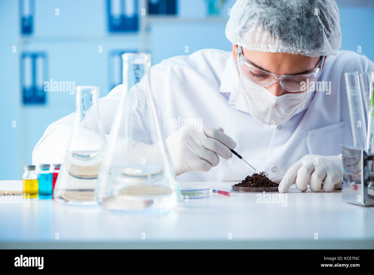 Male scientist researcher doing experiment in a laboratory Stock Photo ...