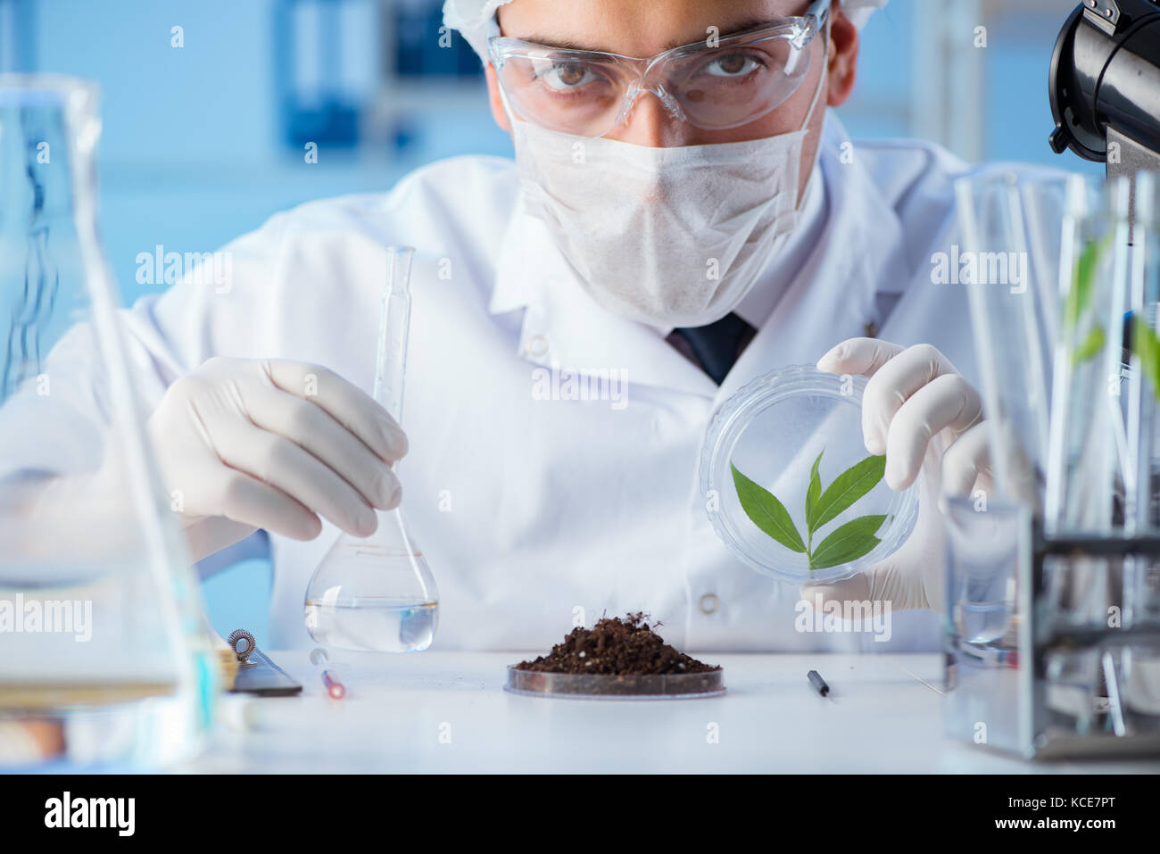 Male scientist researcher doing experiment in a laboratory Stock Photo ...