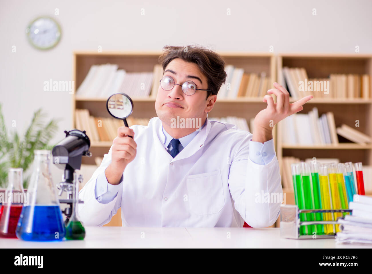 Mad crazy scientist doctor doing experiments in a laboratory Stock ...