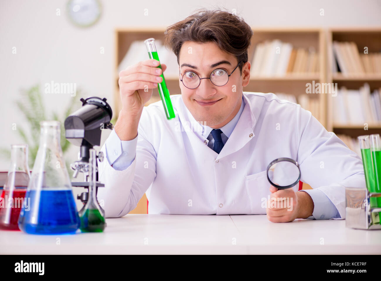 Mad crazy scientist doctor doing experiments in a laboratory Stock ...