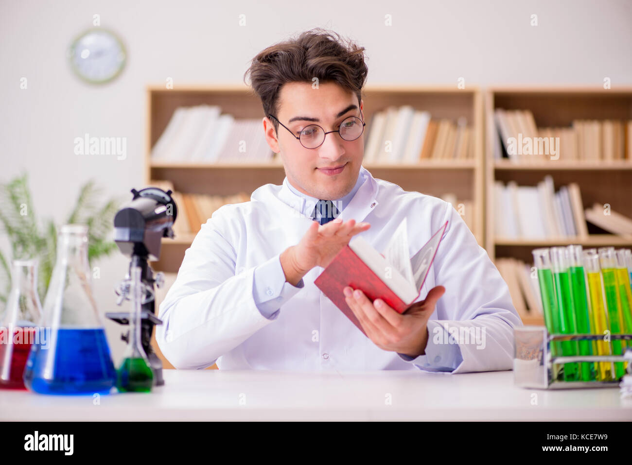 Mad crazy scientist doctor doing experiments in a laboratory Stock ...