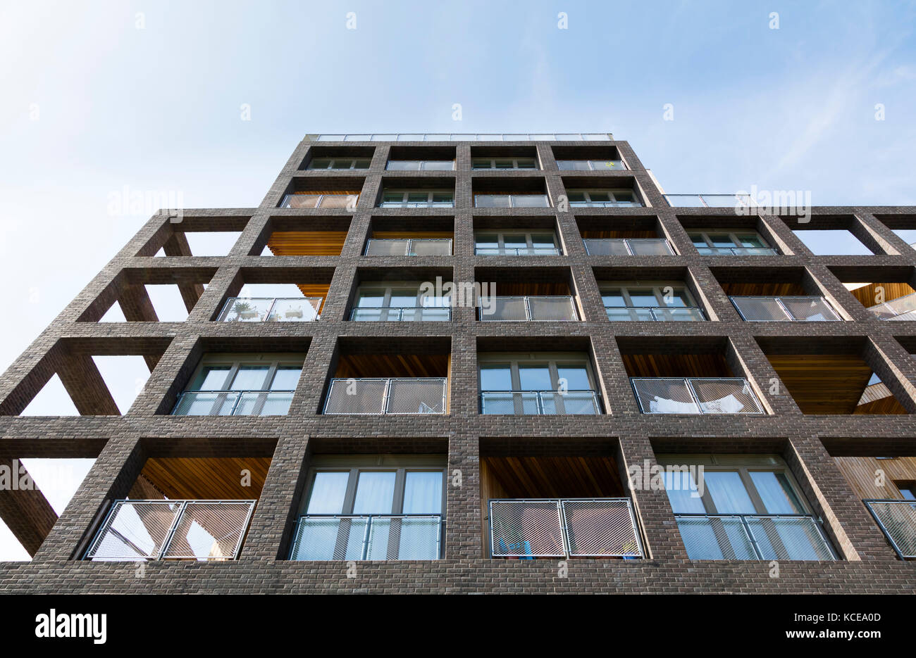 Square grid pattern on the facade of Banyan Wharf homes in Hackney ...