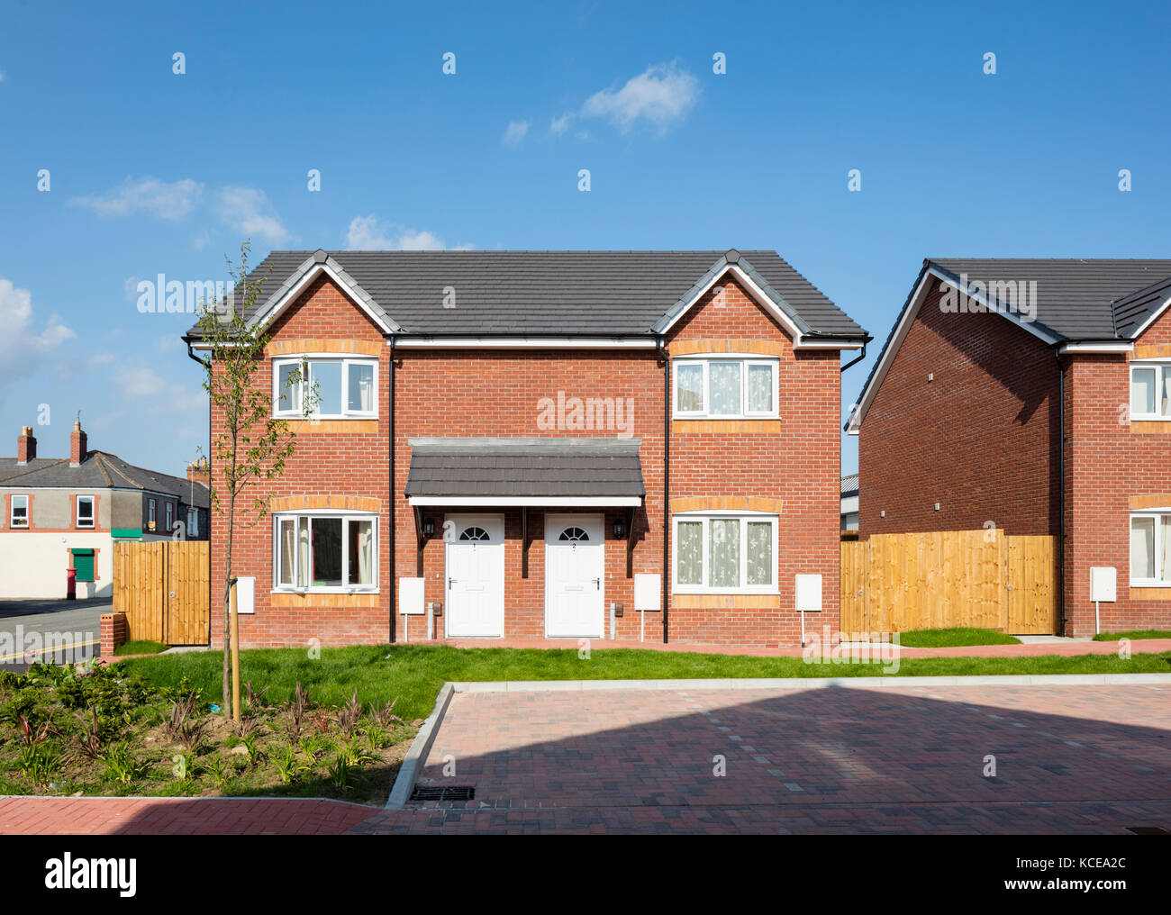 New build homes in traditionlal style of brick and pitched roof. Wales ...