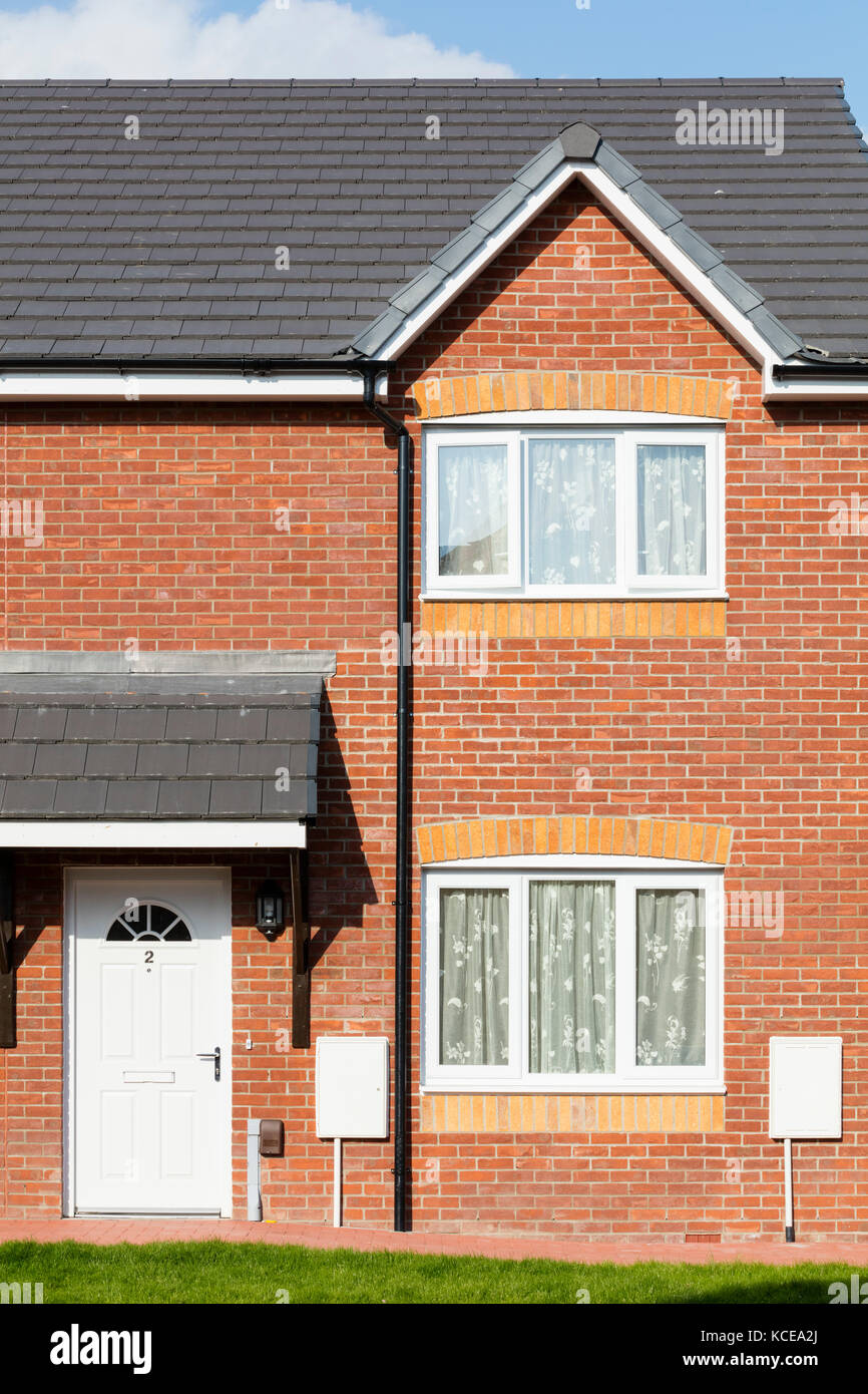 New build homes in traditionlal style of brick and pitched roof. Wales ...