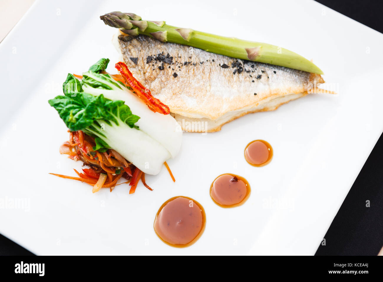 Bream fish with vegetables Stock Photo - Alamy