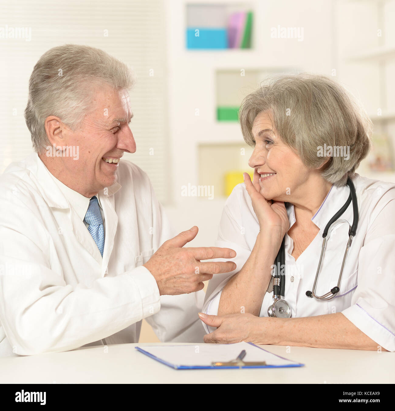 Male female doctors discussing hi-res stock photography and images - Alamy