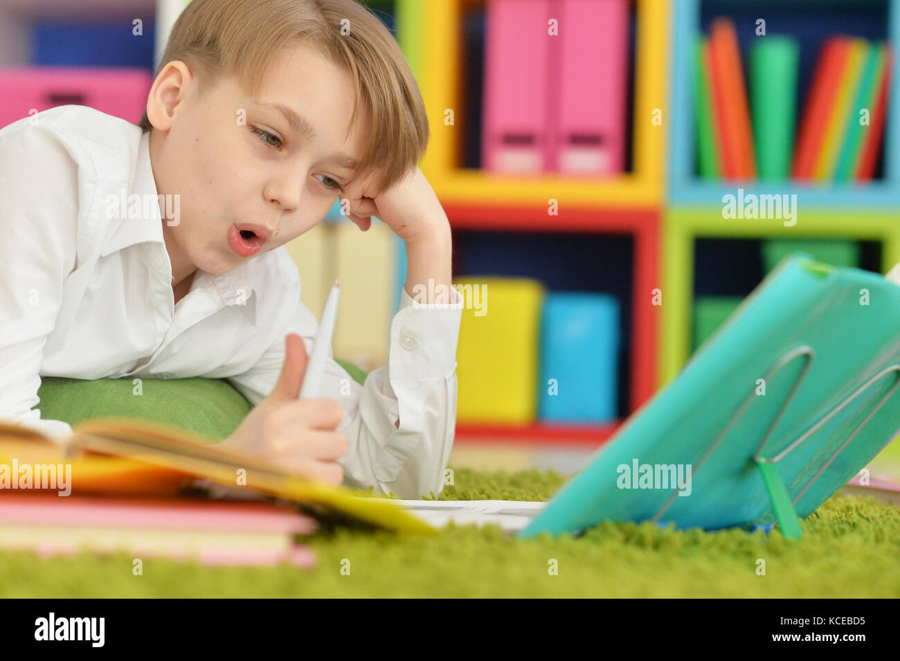 boy doing homework Stock Photo - Alamy