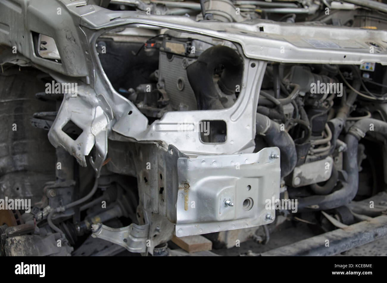 Close-up of the deformed chassis of a crashed car Stock Photo - Alamy