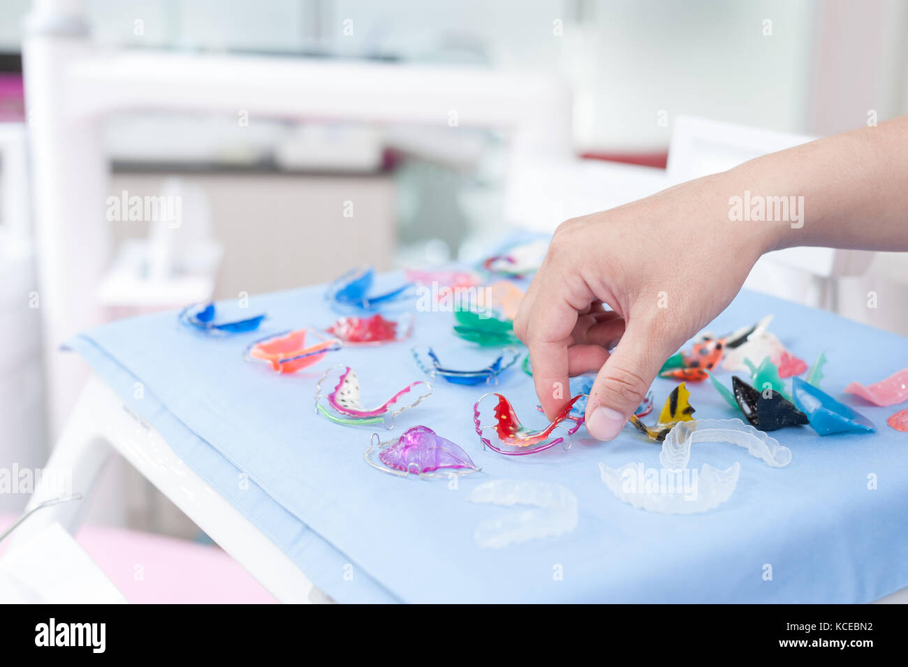 Dental braces or teeth retainers on table in dental clinic. Dental care ...