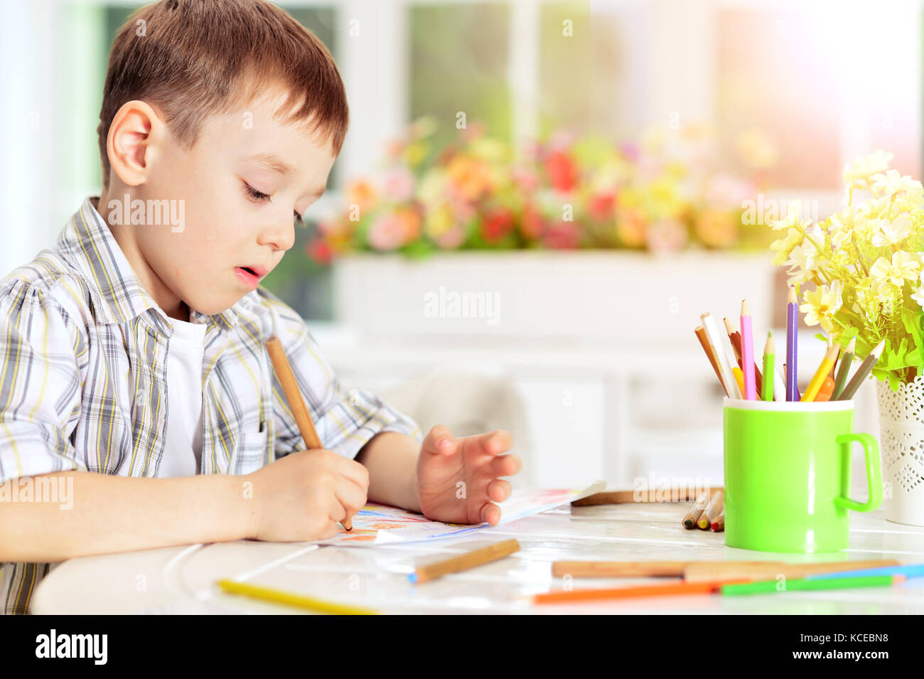 little boy drawing with pencil Stock Photo - Alamy