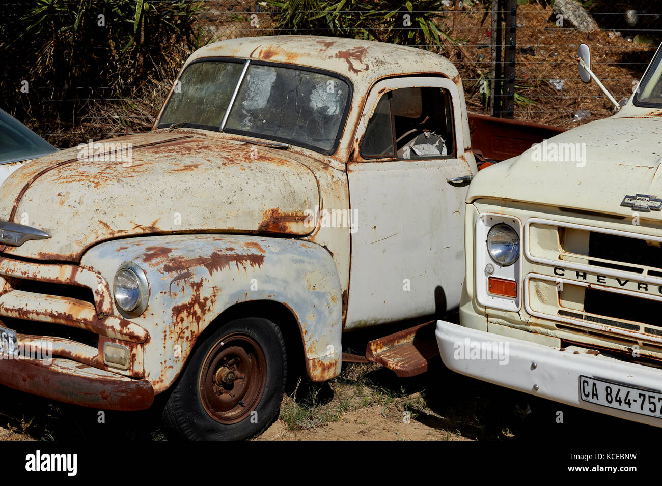 Old rusty classic van in a scrap yard Stock Photo - Alamy