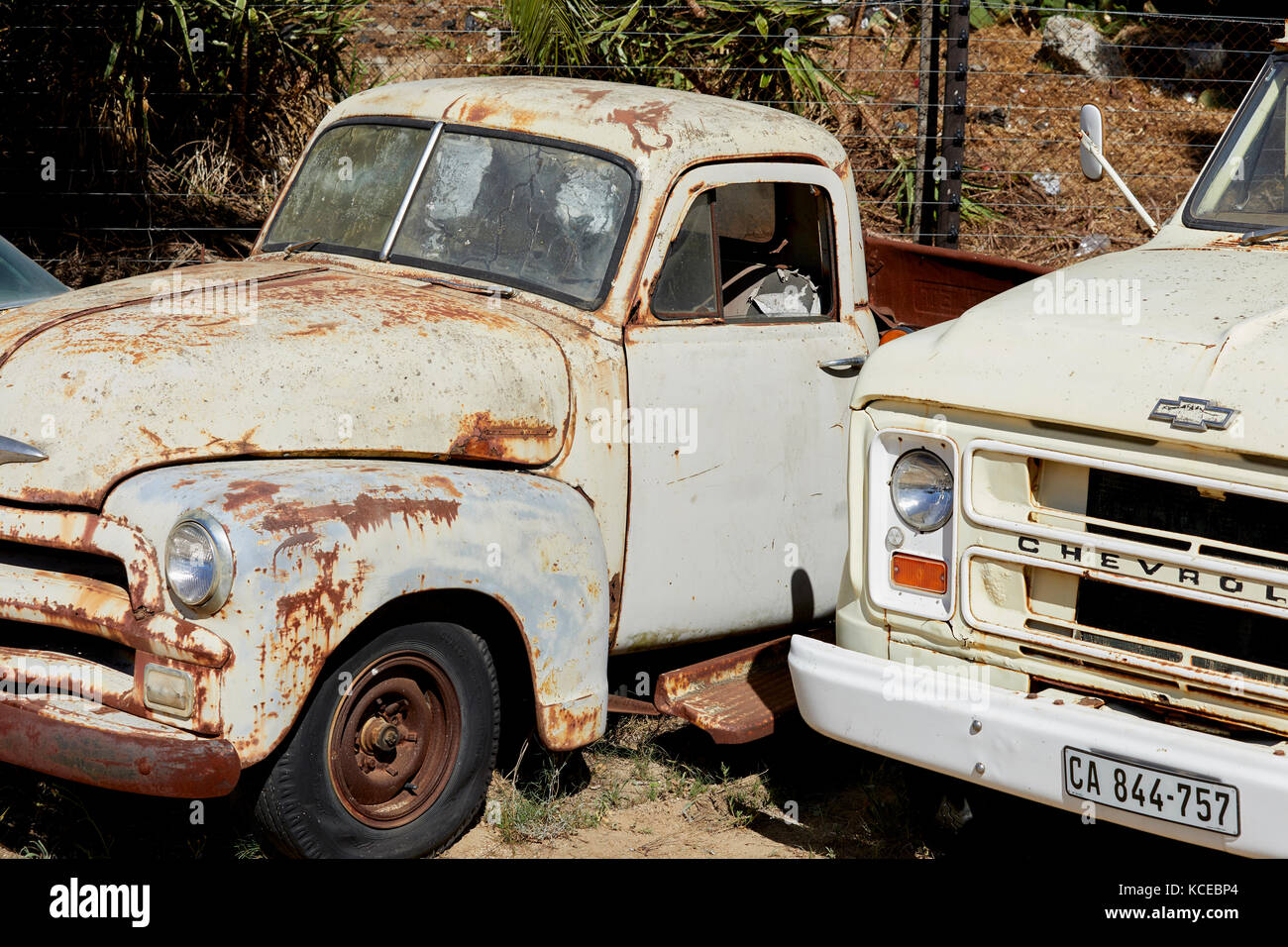 Old rusty classic van in a scrap yard Stock Photo - Alamy
