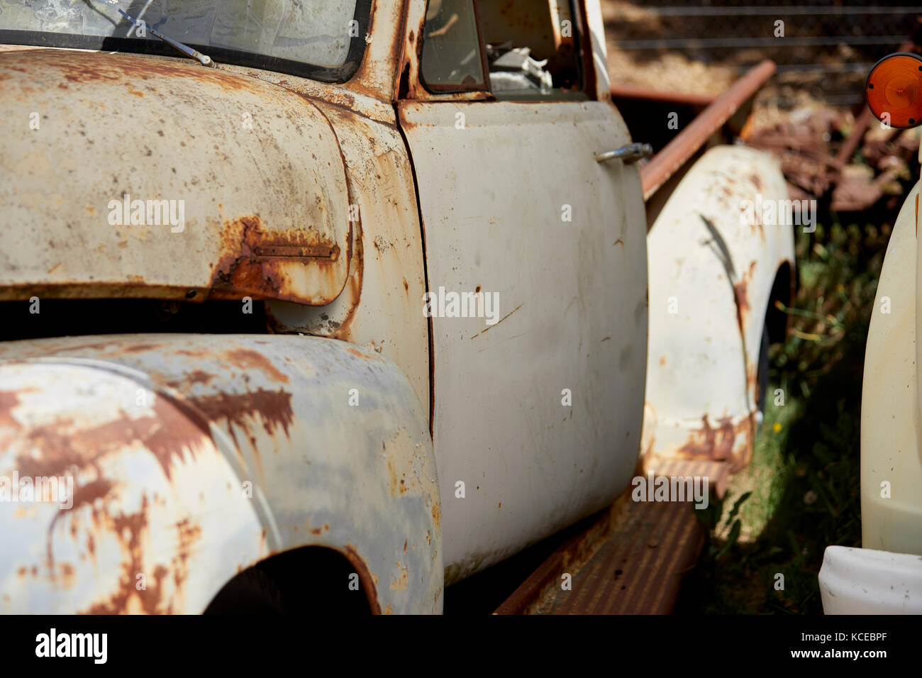 Old rusty classic van in a scrap yard Stock Photo - Alamy