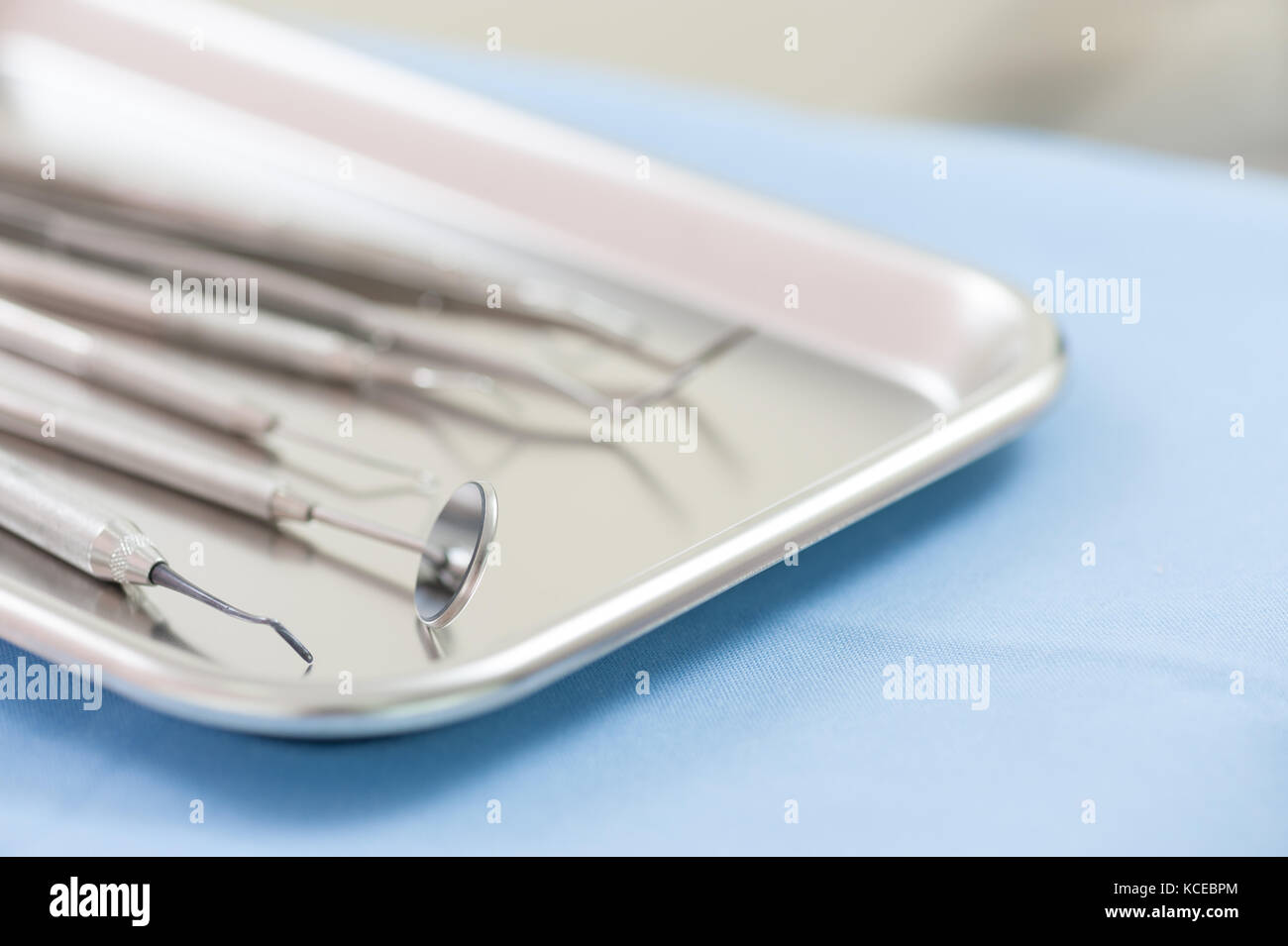 Dental instrument set for dentistry treatment on metal tray in clinic ...