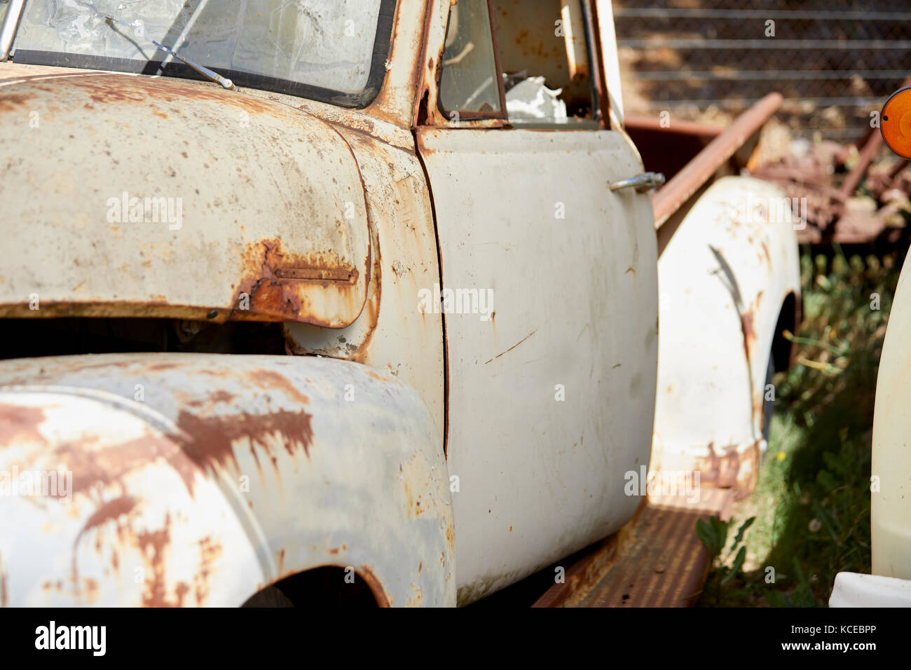 Old rusty classic van in a scrap yard Stock Photo - Alamy