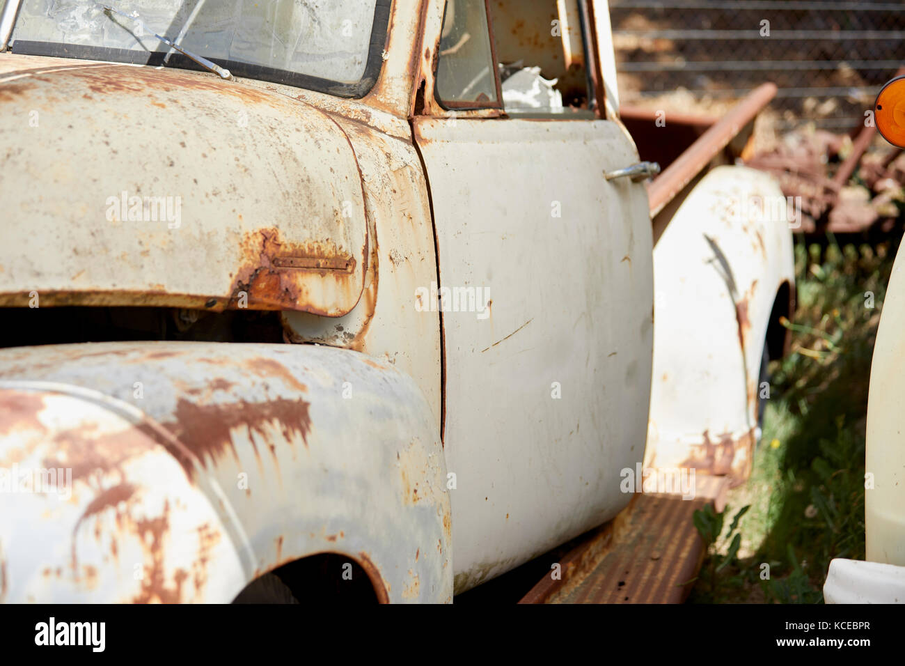 Old rusty classic van in a scrap yard Stock Photo - Alamy