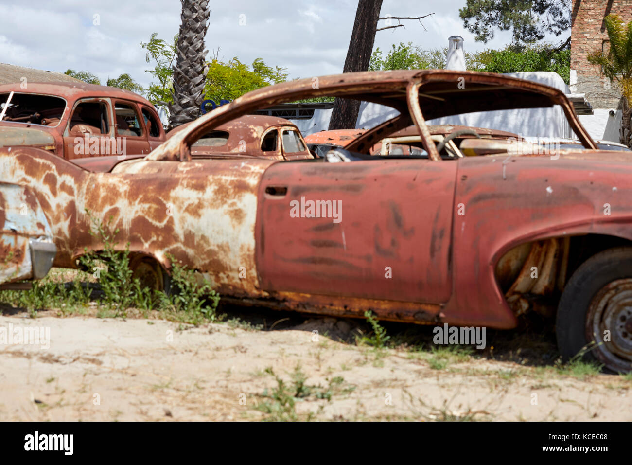 Old rusty classic van in a scrap yard Stock Photo - Alamy