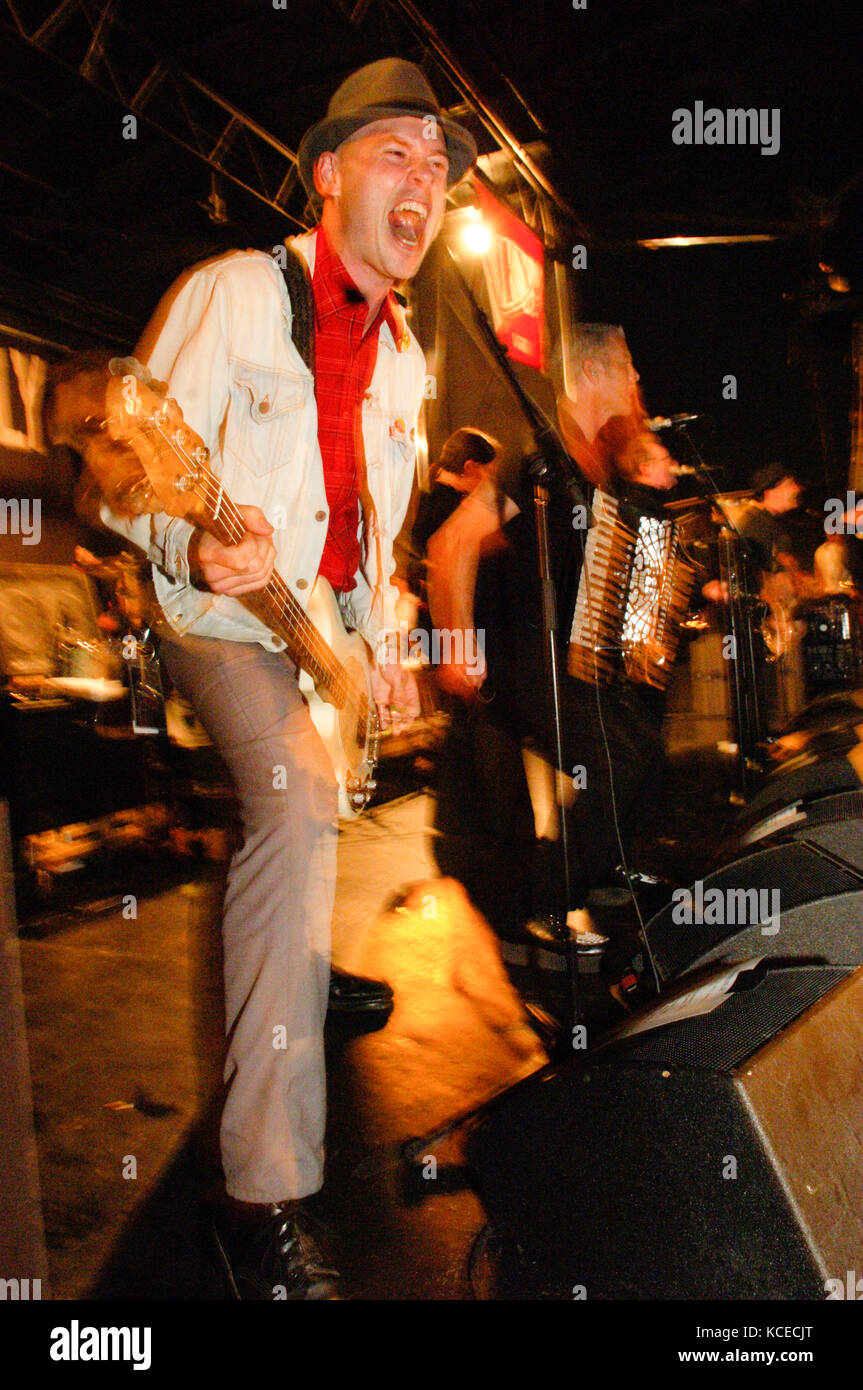 Nathan Maxwell of Flogging Molly performs at the 2007 Vans Warped Tour ...