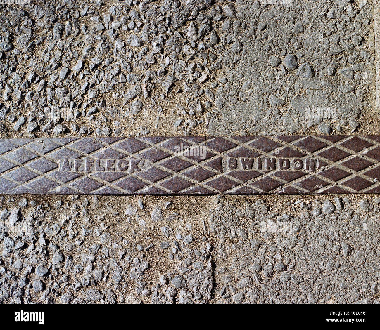 Swindon, Wiltshire. Pavement rainwater gully cover plate made by ...