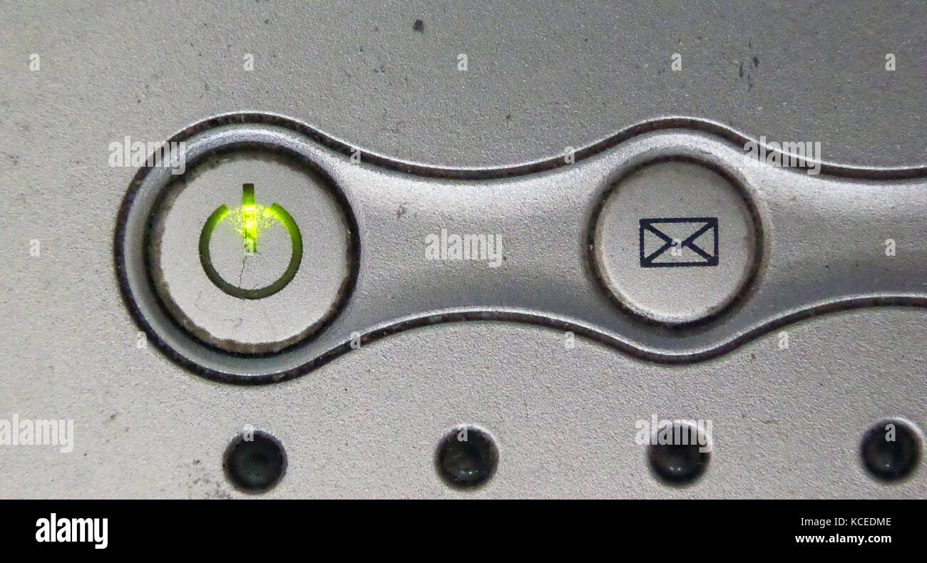 Dirty and dusty switch button (On/Off) on a laptop Stock Photo - Alamy