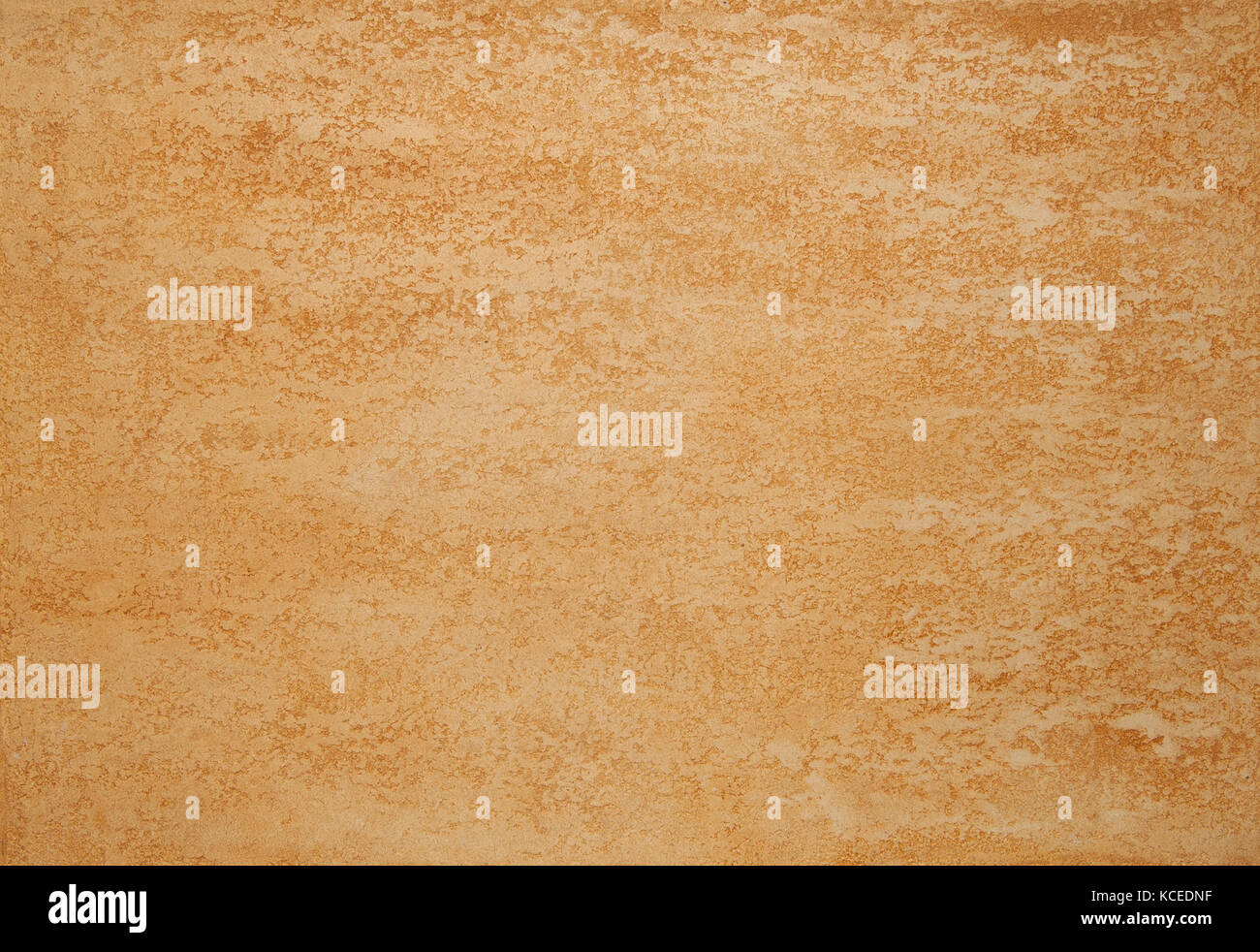 background of textured plaster of golden color. art background Stock ...