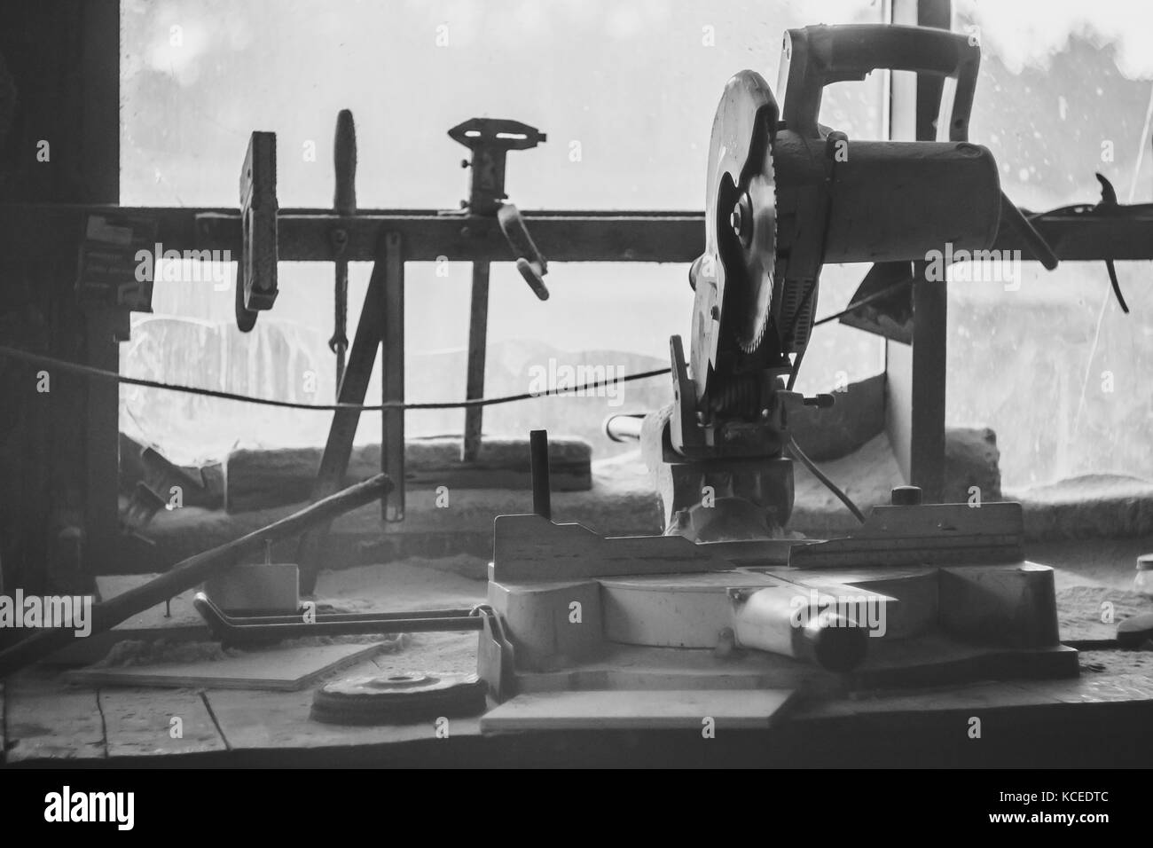 Power tools in hand Black and White Stock Photos & Images - Alamy