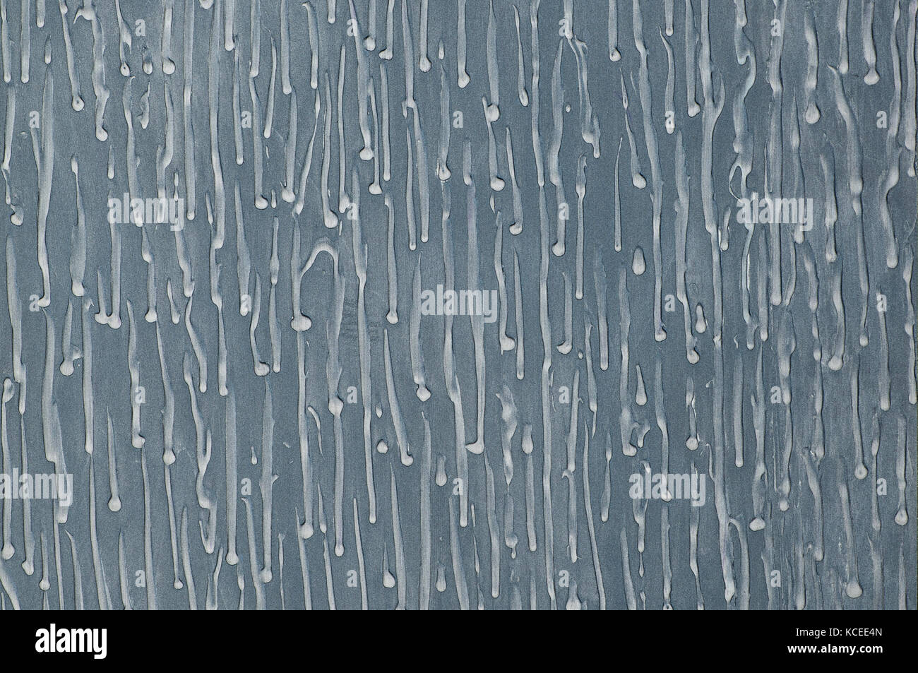 background with drops and streaks of gray color. artistic background ...