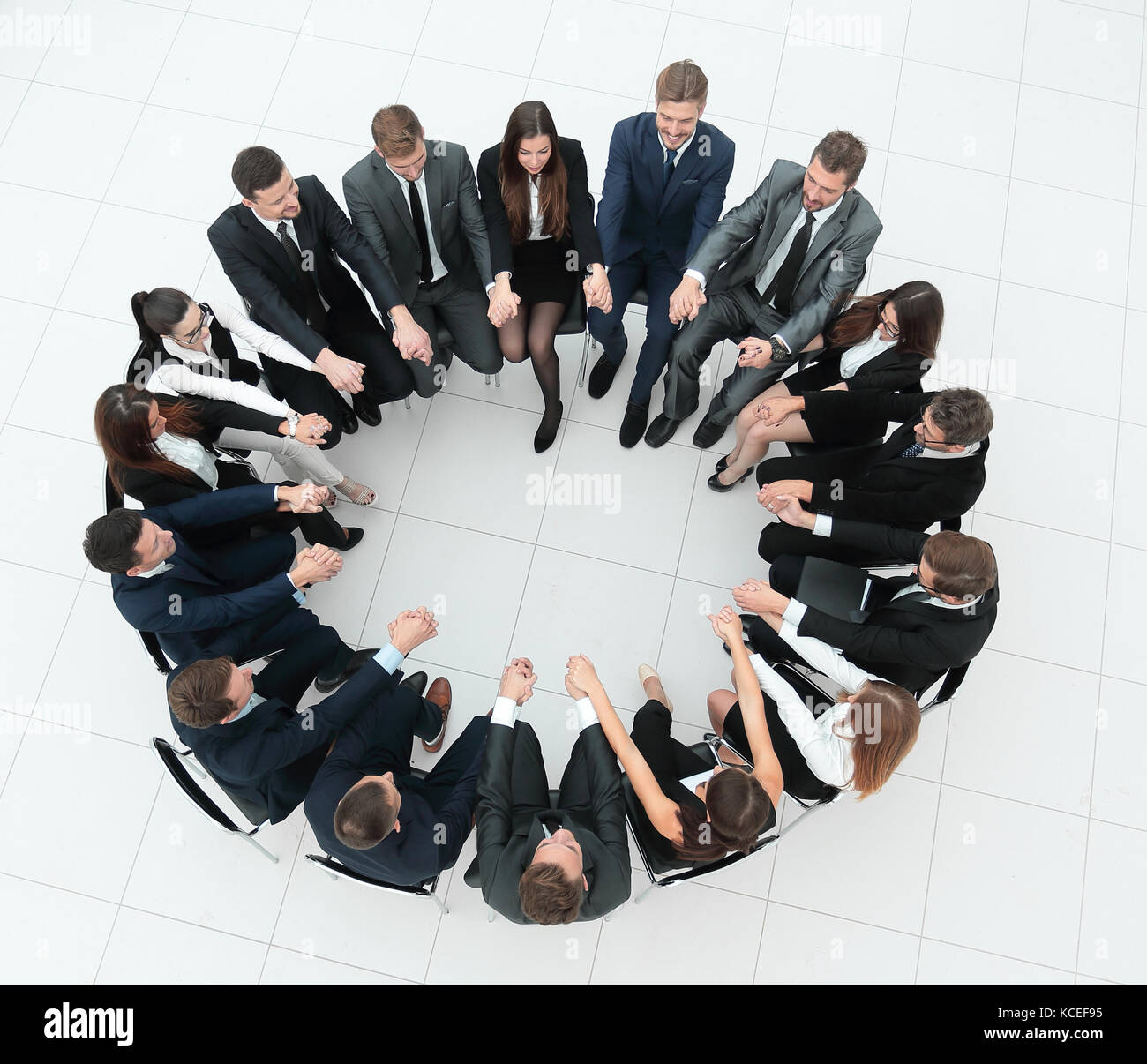 concept of team building.large business team sitting in a circle Stock ...