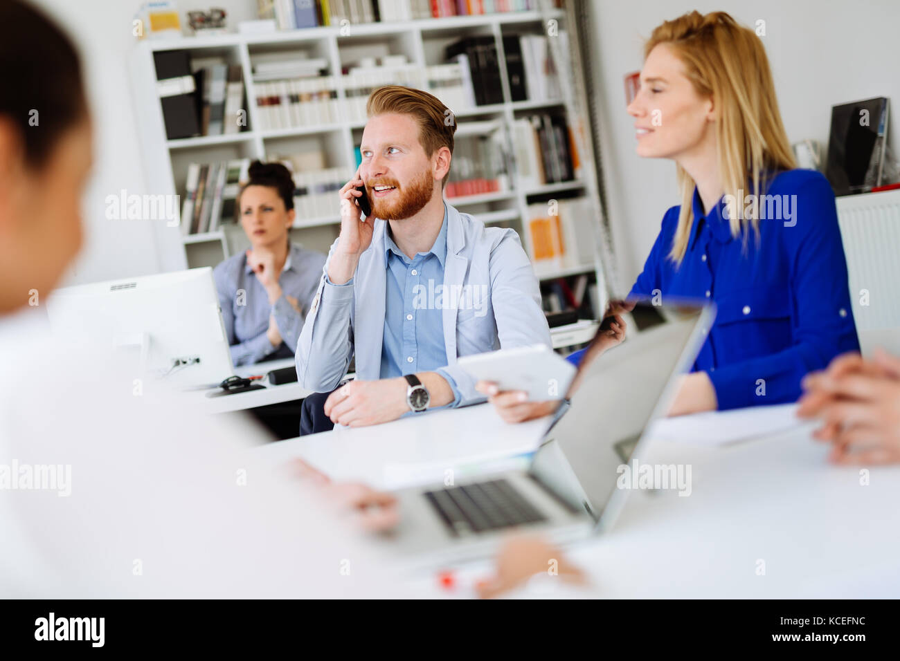 Business people using devices Stock Photo - Alamy
