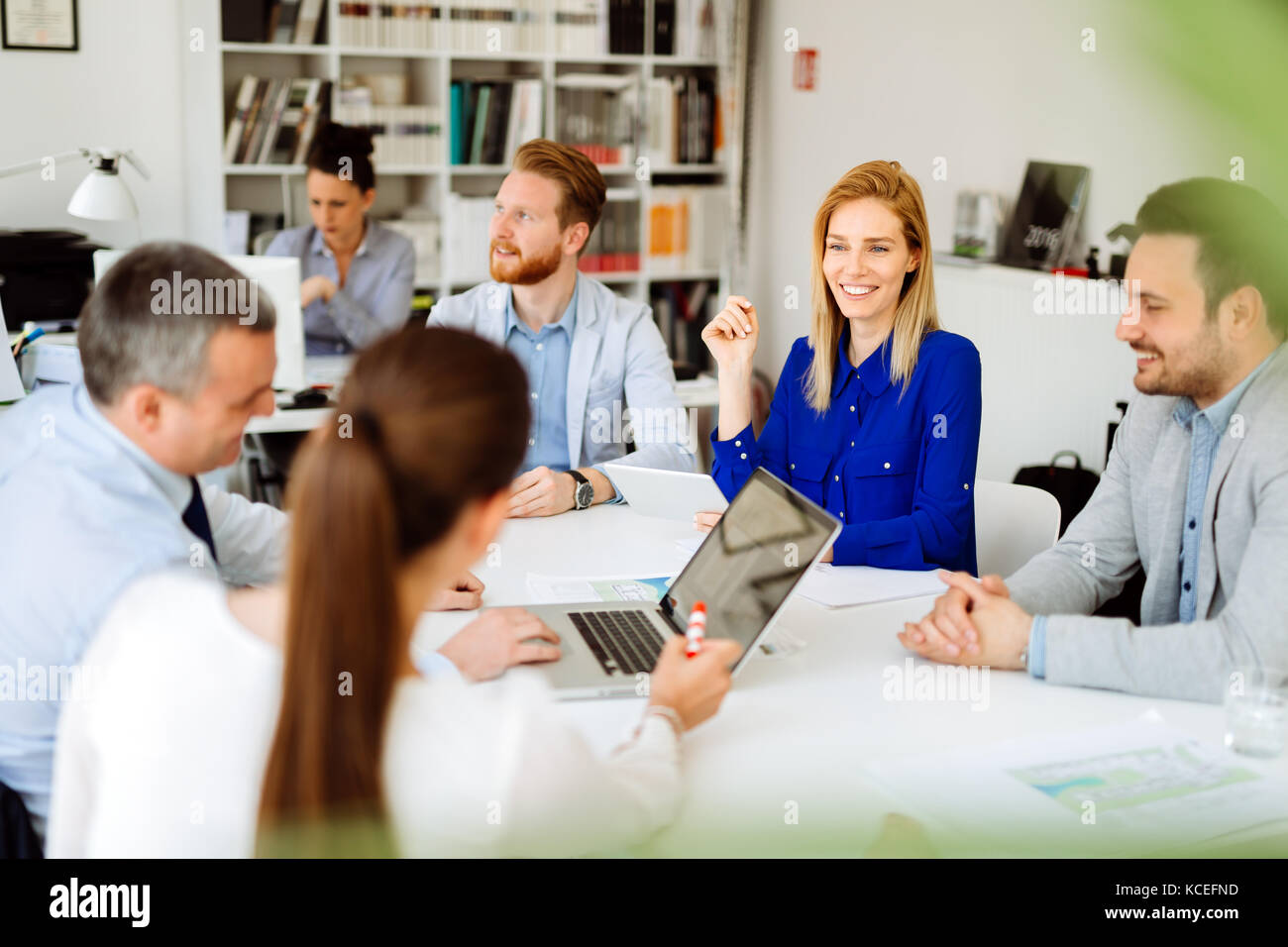 Diverse group young people collaborating hi-res stock photography and ...