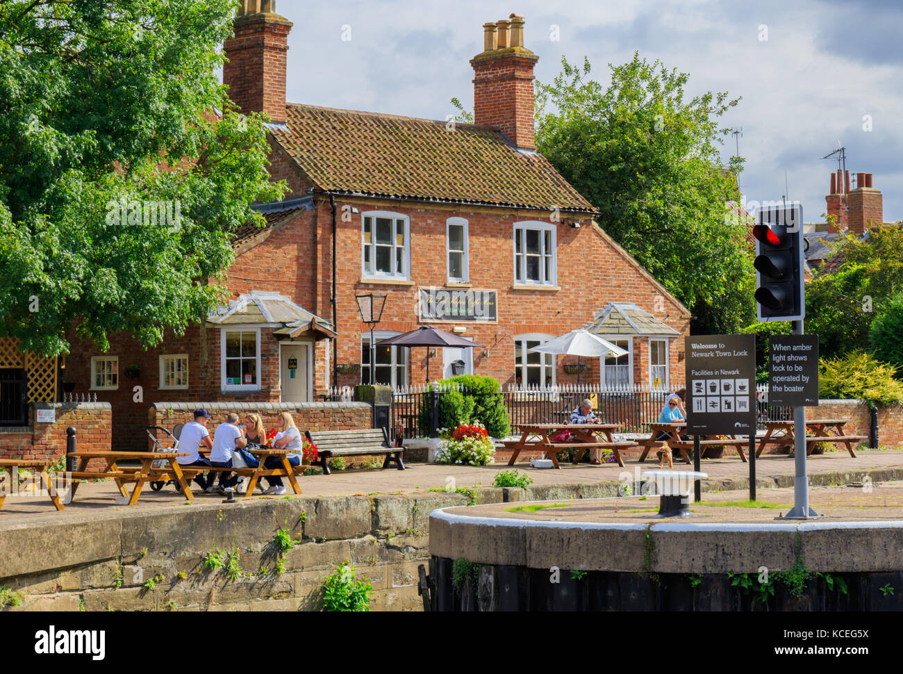 People enjoying sitting outside The Lock Keepers Coffee House café ...