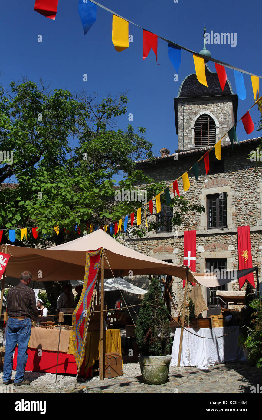 PEROUGES, FRANCE - JUNE 16 : Tourists during the Medieval Festival, in ...