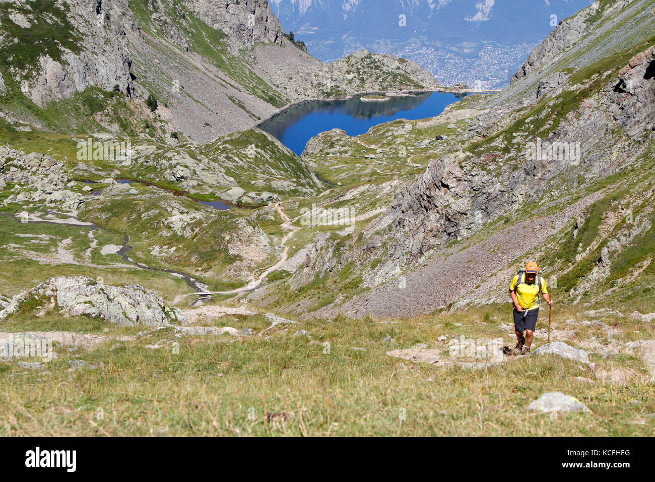 LA PRA, FRANCE, August 23, 2016 : A lonely hiker climbs the path to the ...