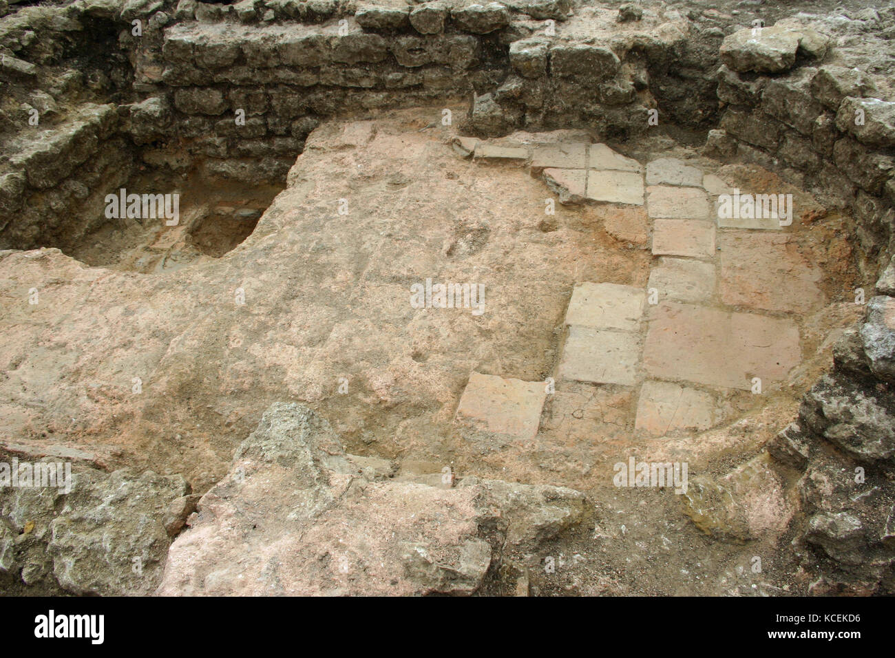 An excavated archaeological dig of a roman villa showing the cold range ...