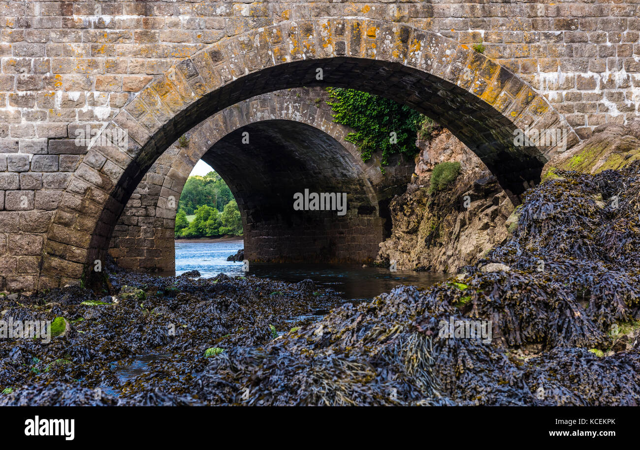 Two stone arches over a river near Audierene, Brittany, France Stock ...