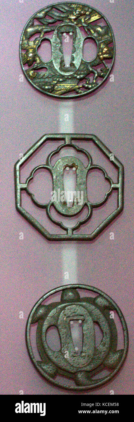 Decorative sword-guards from Japan known as Tsuba, used to prevent the ...