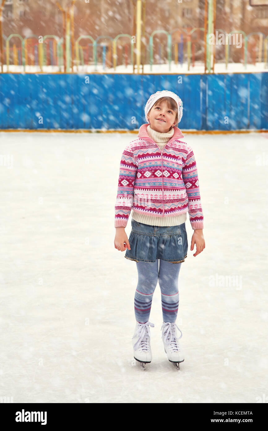 girl ice skating on rink Stock Photo - Alamy