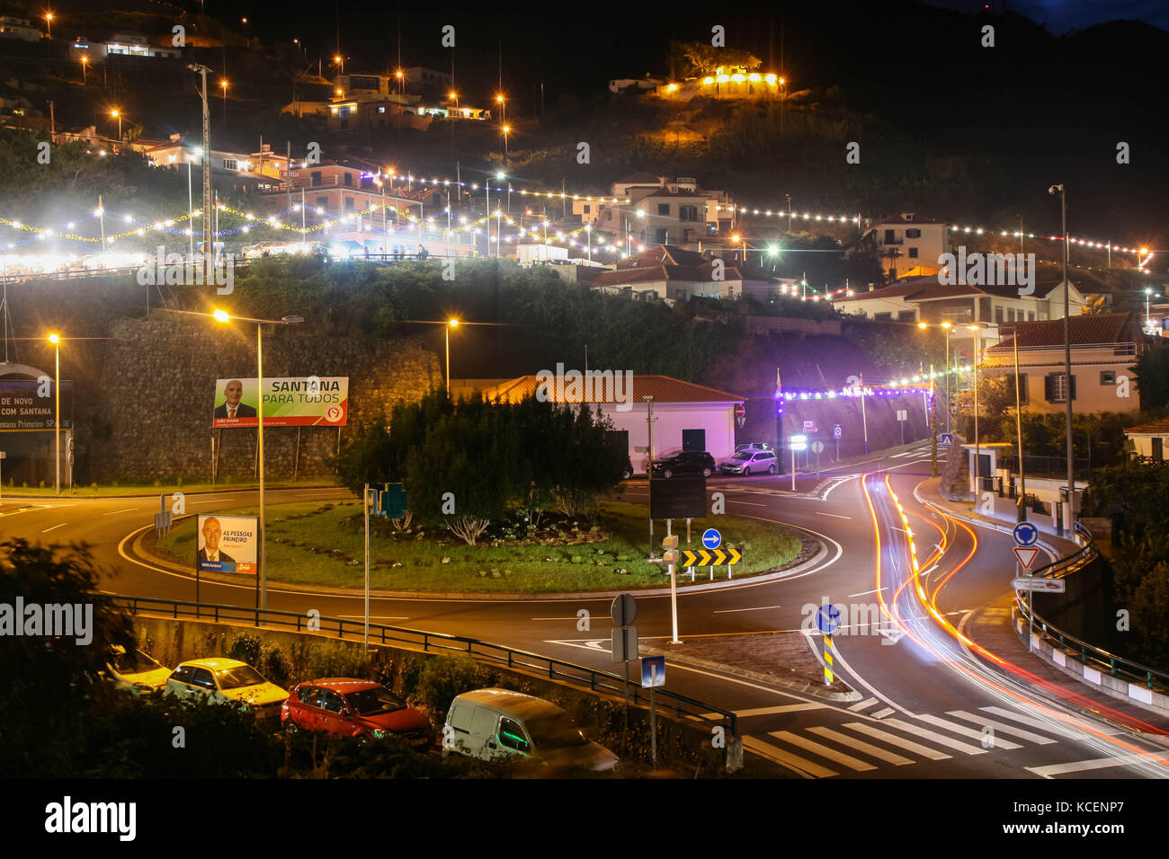 Light trails on roundabout at night Stock Photo - Alamy