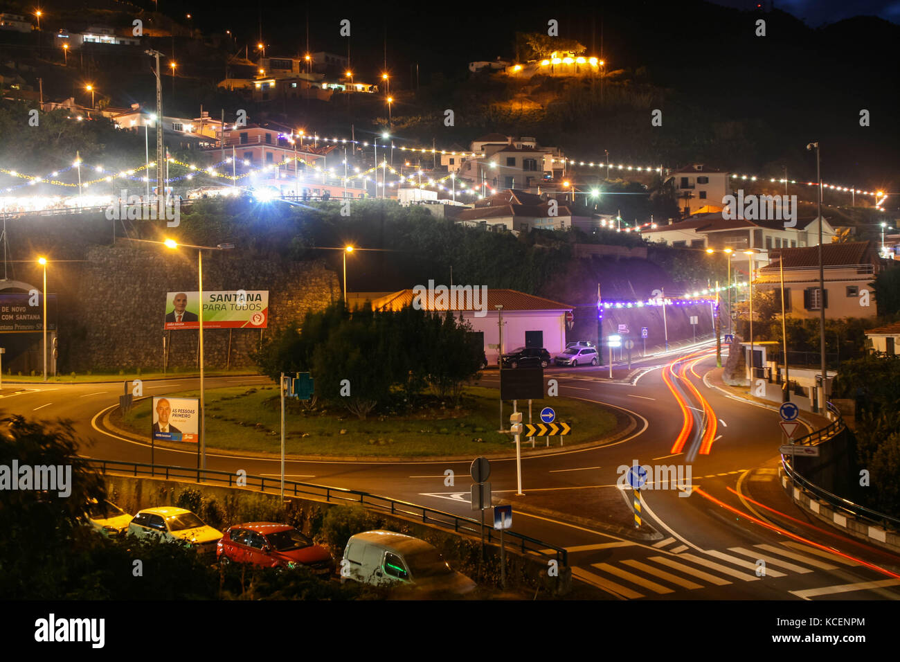 Light trails on roundabout at night Stock Photo - Alamy