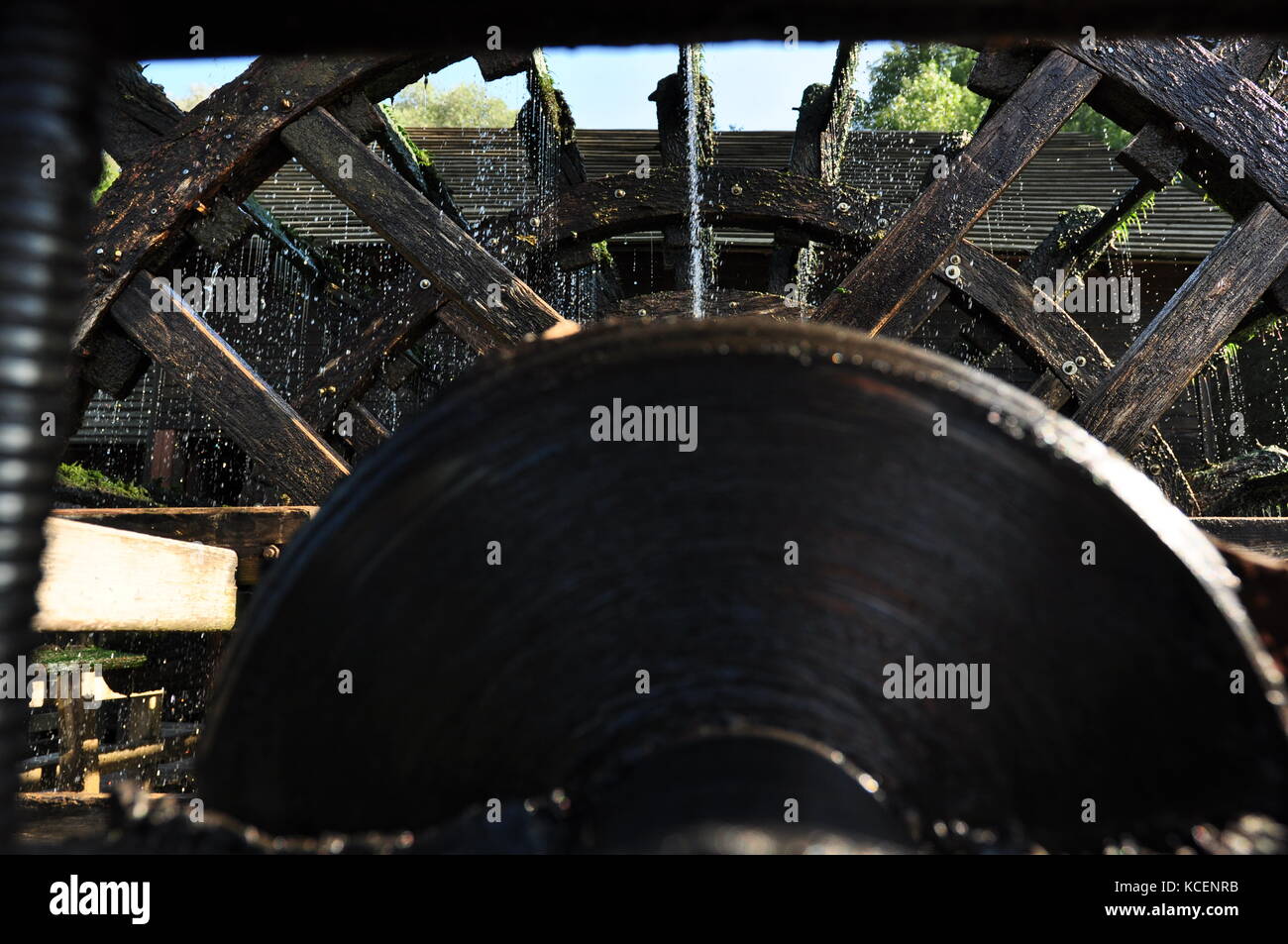 Working water mill wheel on the river Stock Photo - Alamy