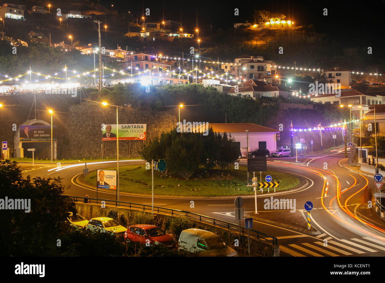 Light trails on roundabout at night Stock Photo - Alamy